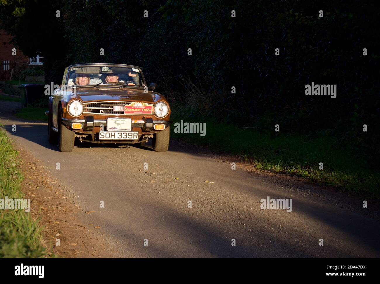 Rally Driving into the evening sun in a Triumph TR6 Stock Photo - Alamy