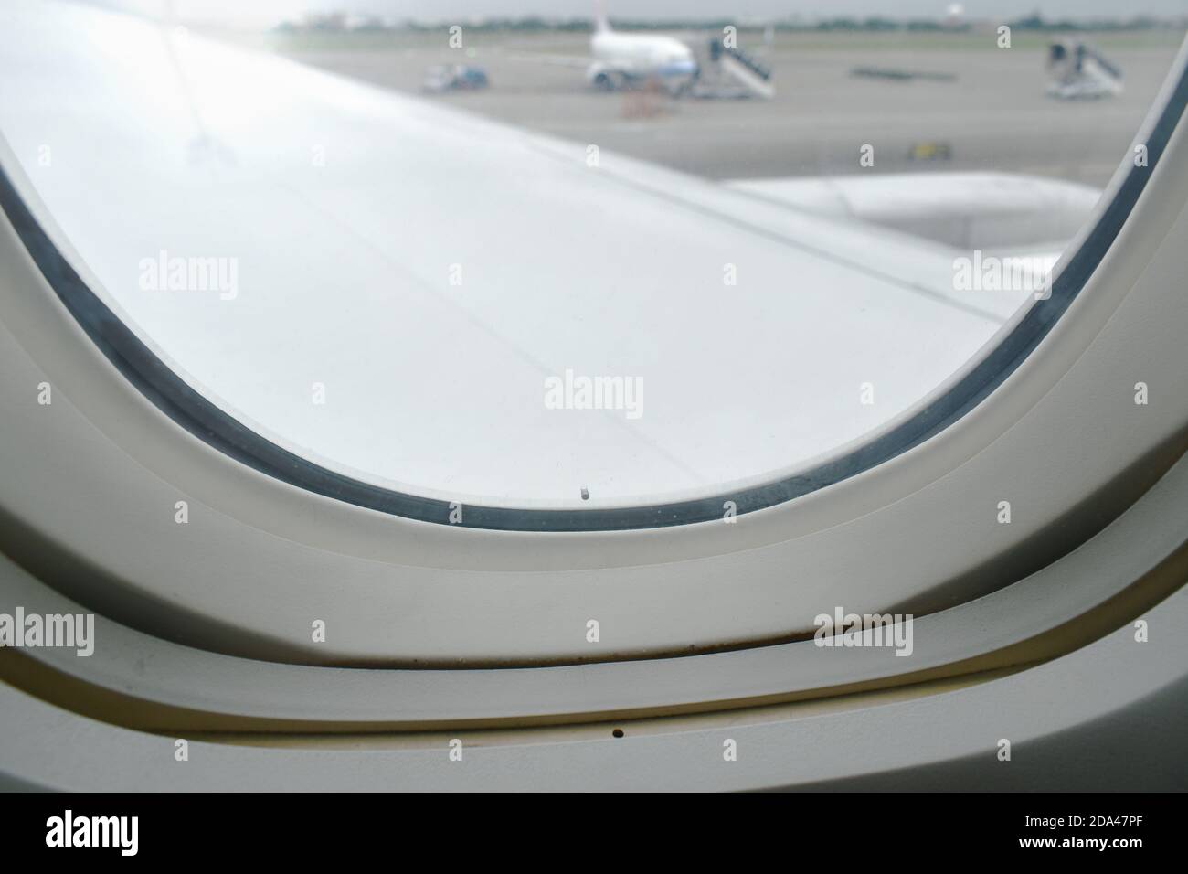 view from plane window on airport runway Stock Photo - Alamy
