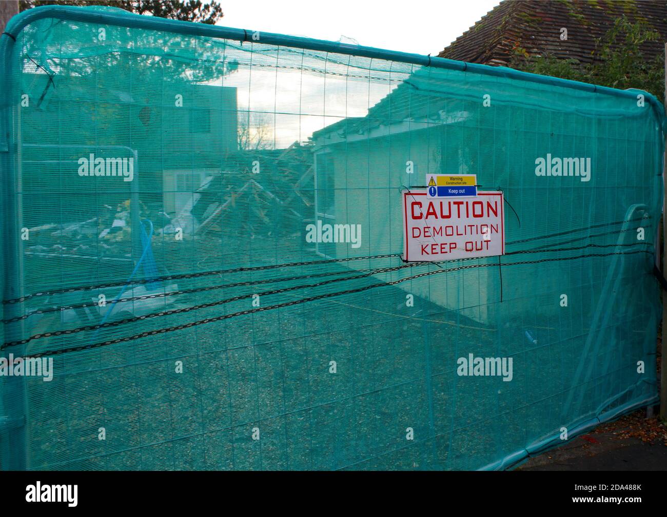 Warning signs on demolition site on waterfront at Chichester Harbour ...