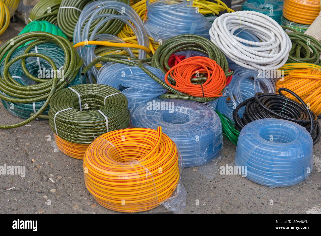 Plastic garden hoses hi-res stock photography and images - Alamy