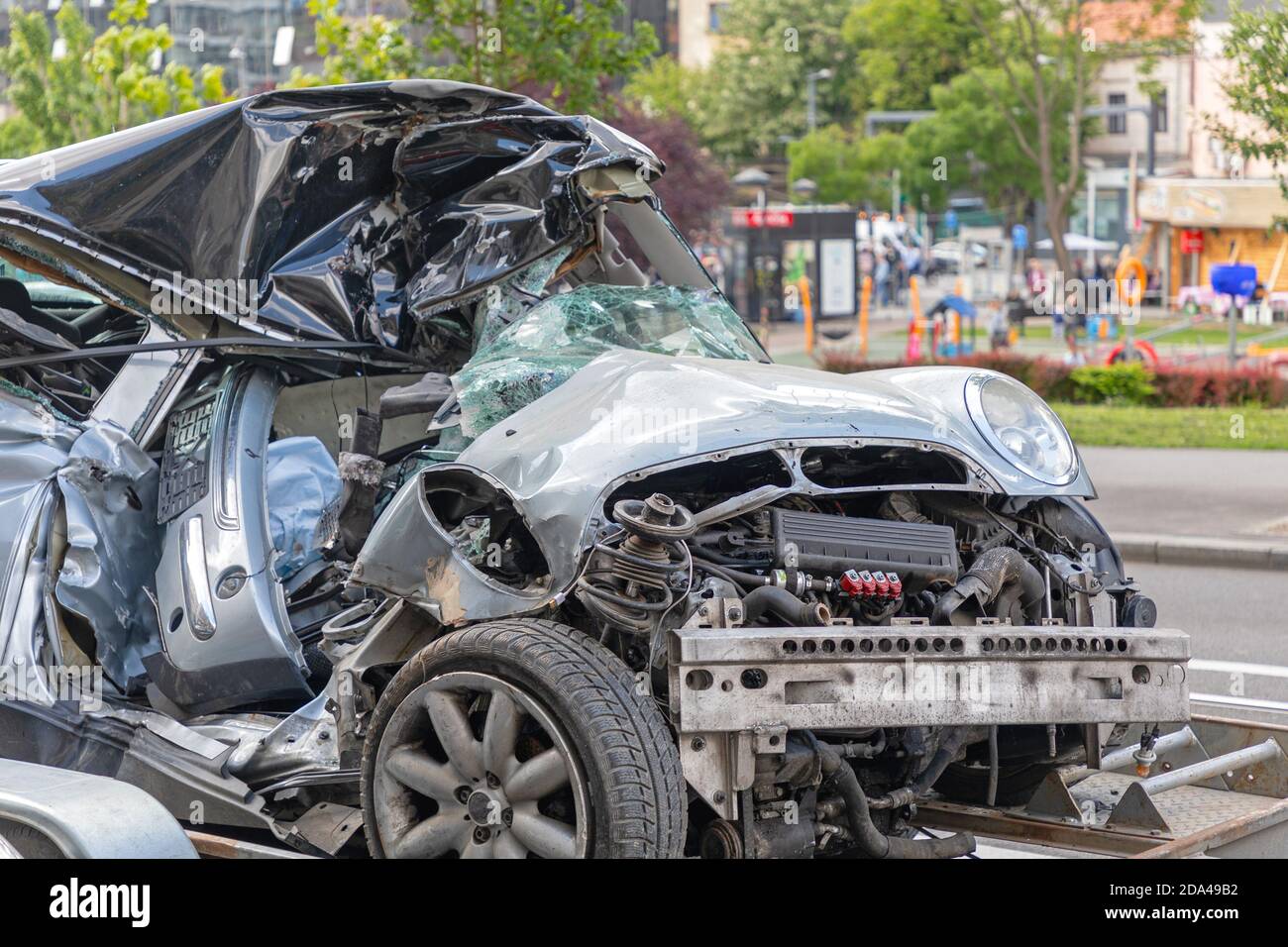 Crushed Small Car Damaged in Traffic Accident Stock Photo - Alamy