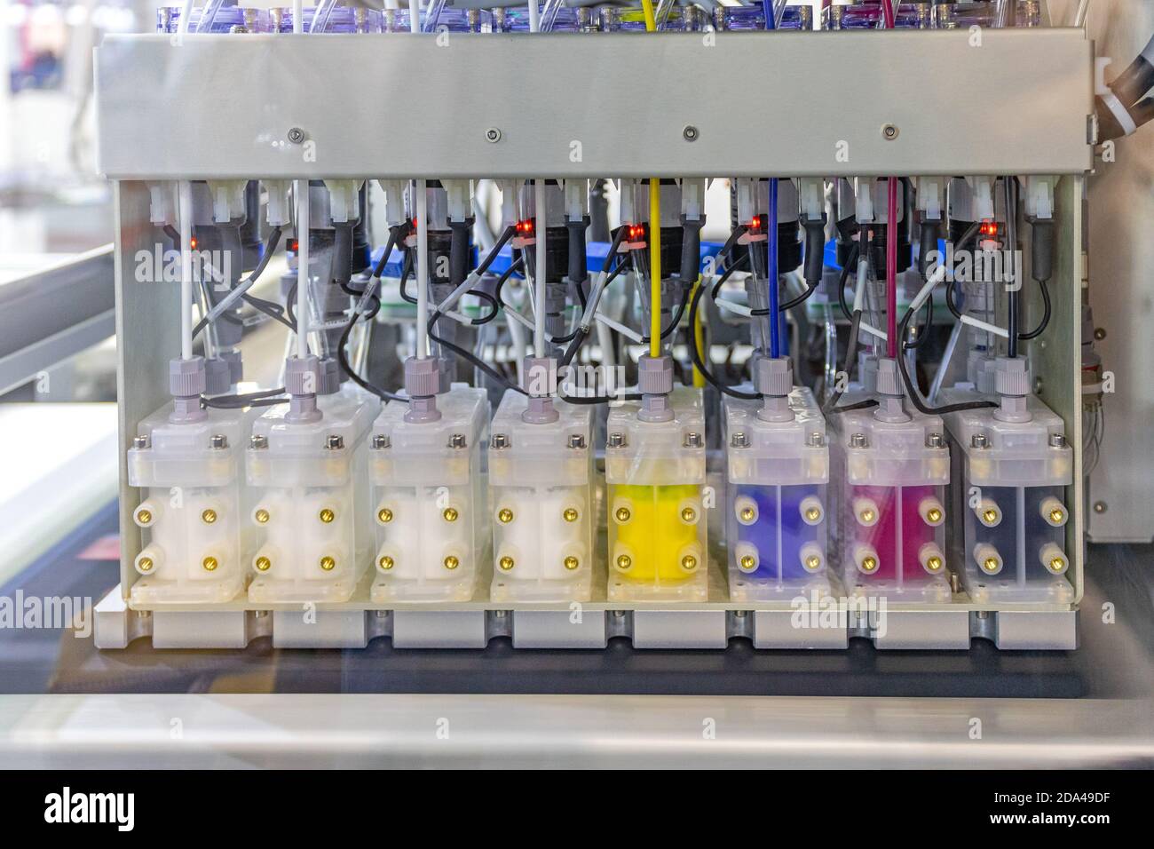 Eight Colour Ink Tank at Big Solvent Printer Stock Photo - Alamy