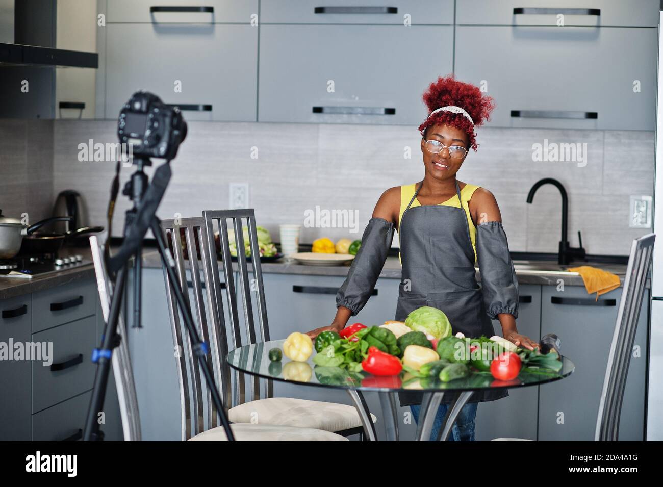 African american cook filming cooking hi-res stock photography and ...