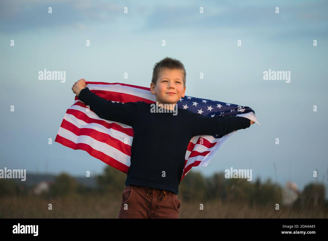 Boy carrying flag hi-res stock photography and images - Alamy