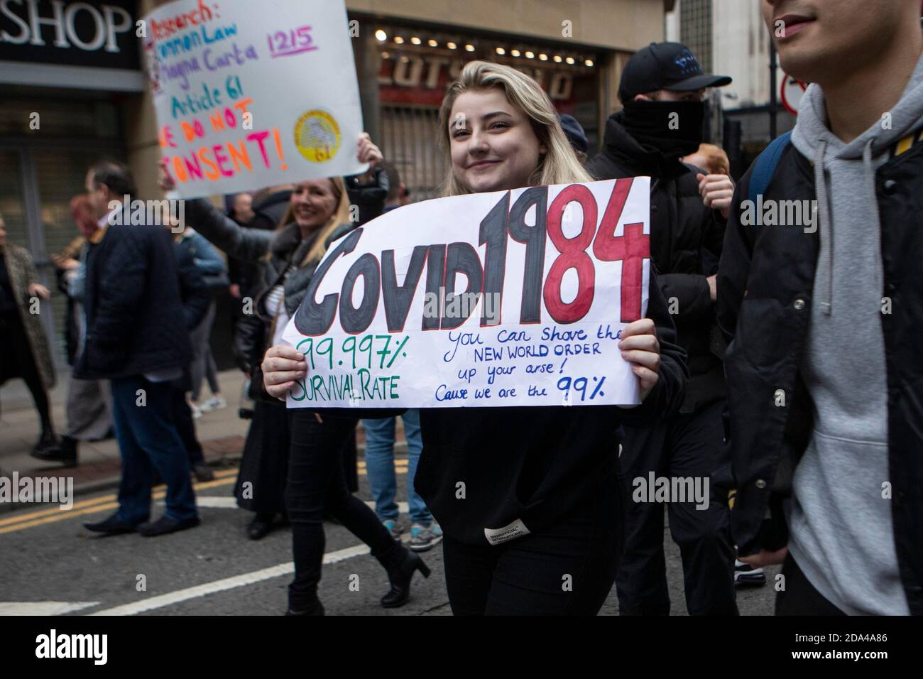 People are detained at anti-lockdown protest in Piccadilly Gardens ...