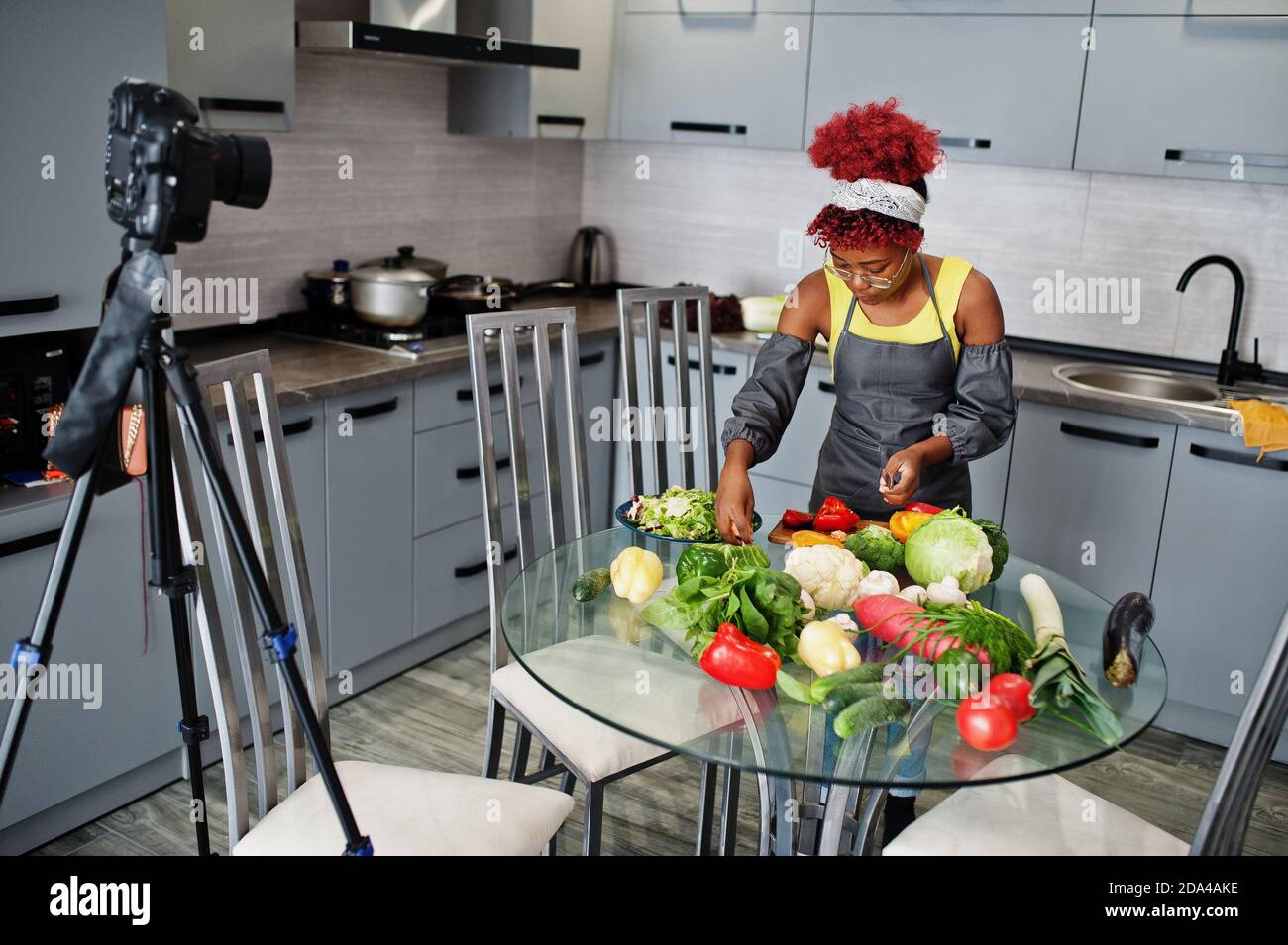 African american cook filming cooking hi-res stock photography and ...