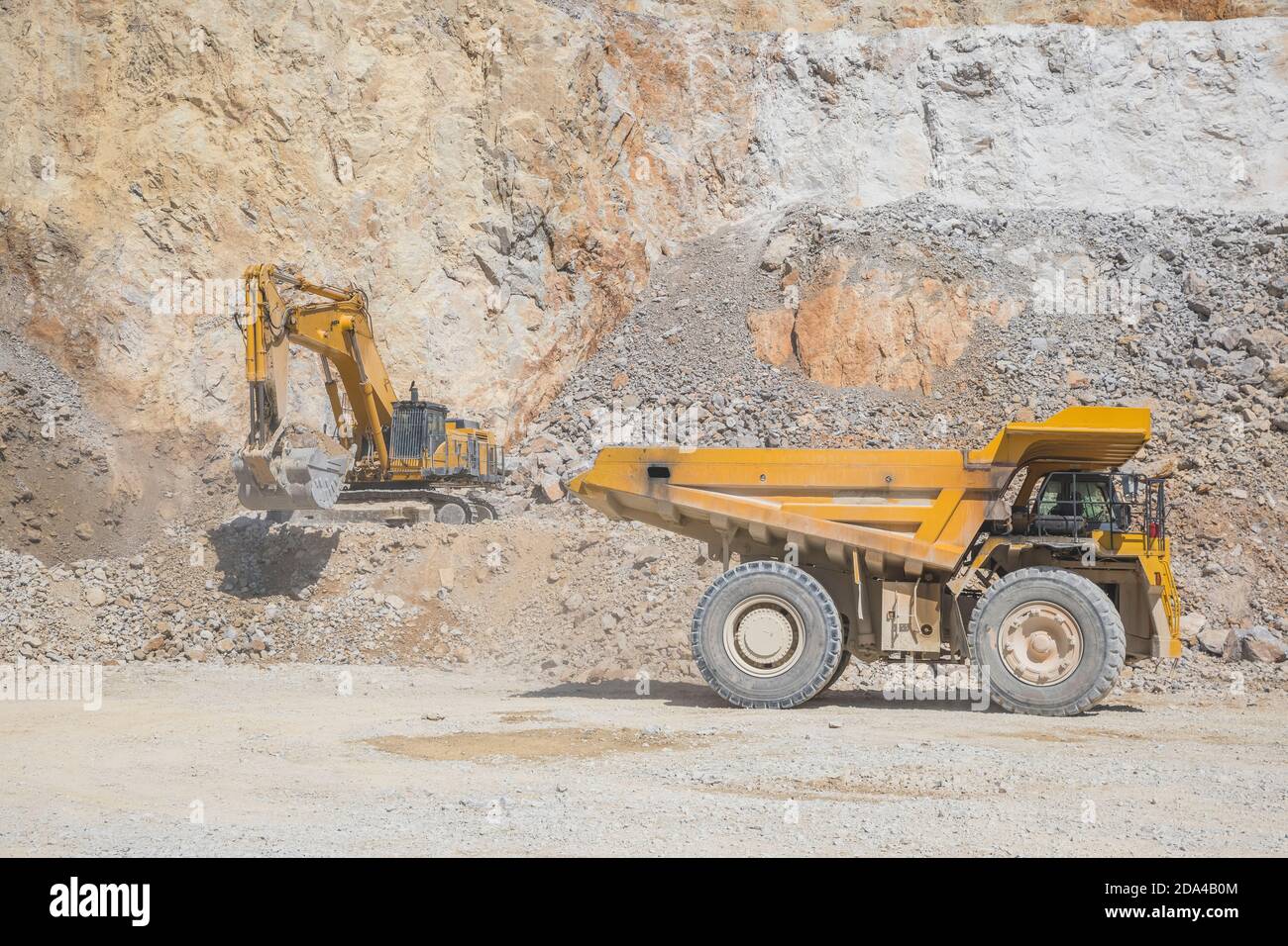 loader loading mining truck at open pit Stock Photo - Alamy