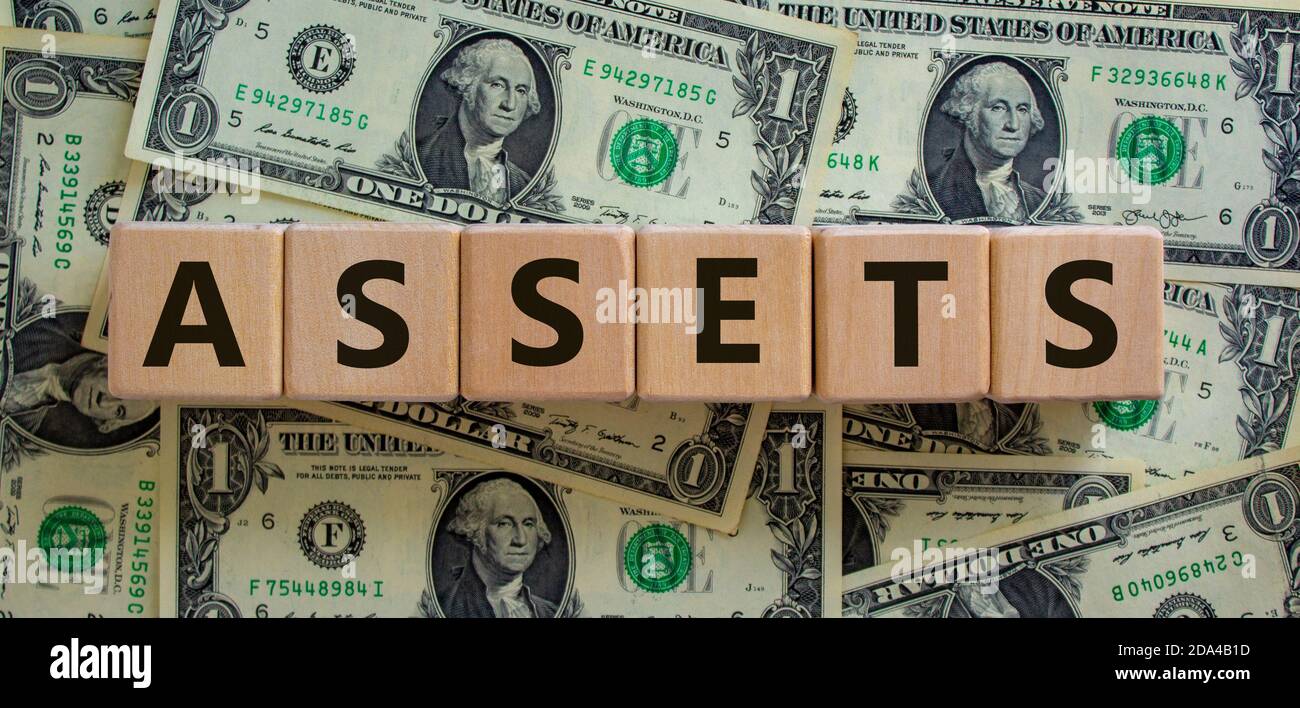 Concept word 'assets' on wooden cubes on a beautiful background from ...