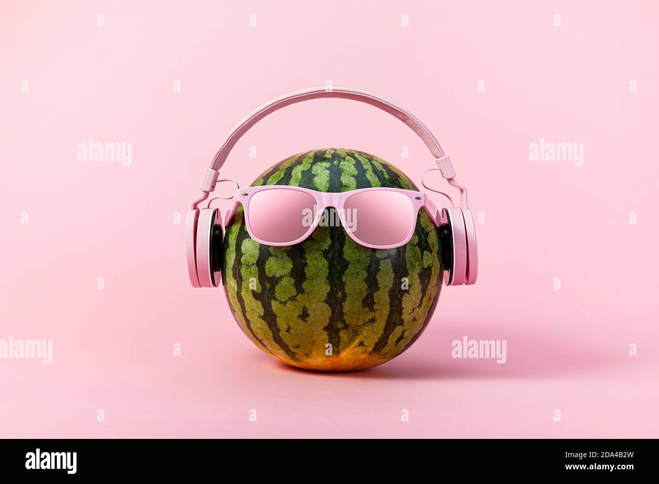 Cool image of watermelon with sunglasses and headphones isolated on a ...