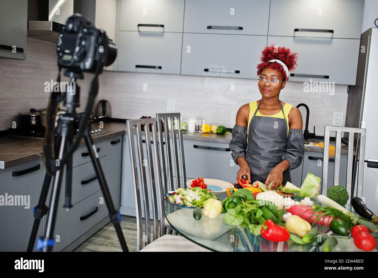 African american cook filming cooking hi-res stock photography and ...