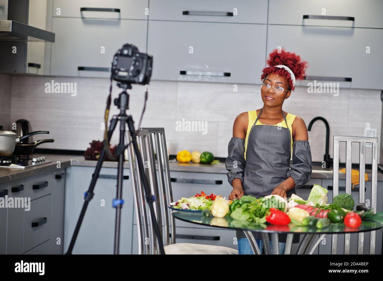 African american cook filming cooking hi-res stock photography and ...