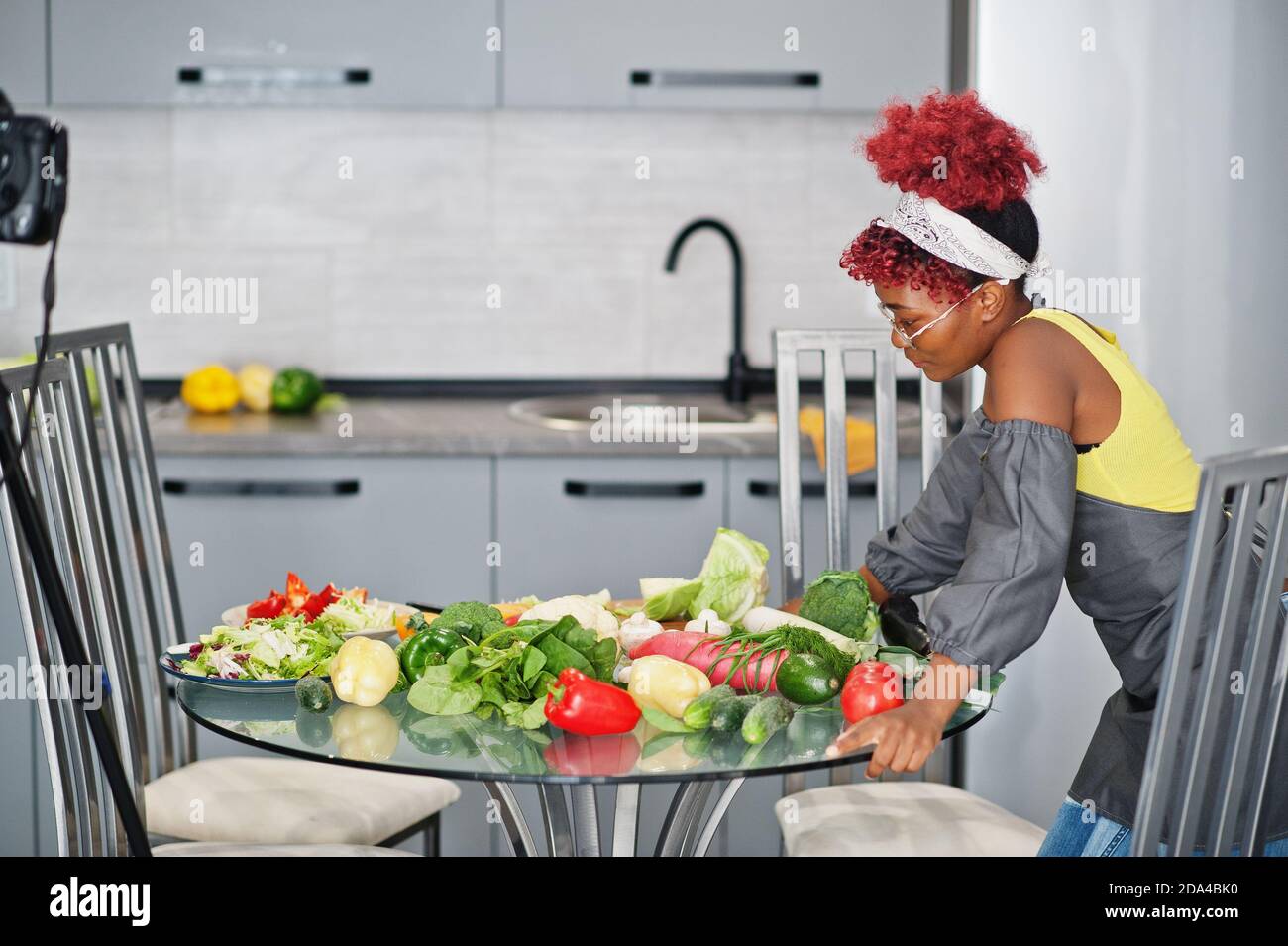 African american cook filming cooking hi-res stock photography and ...
