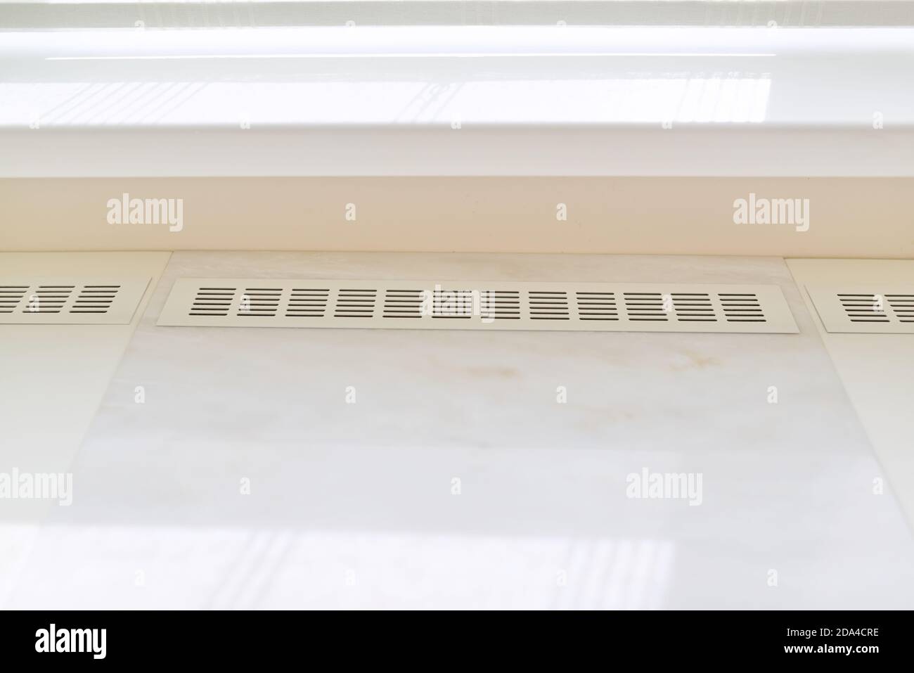 Ventilation grille built into the table, for the heating radiator Stock ...