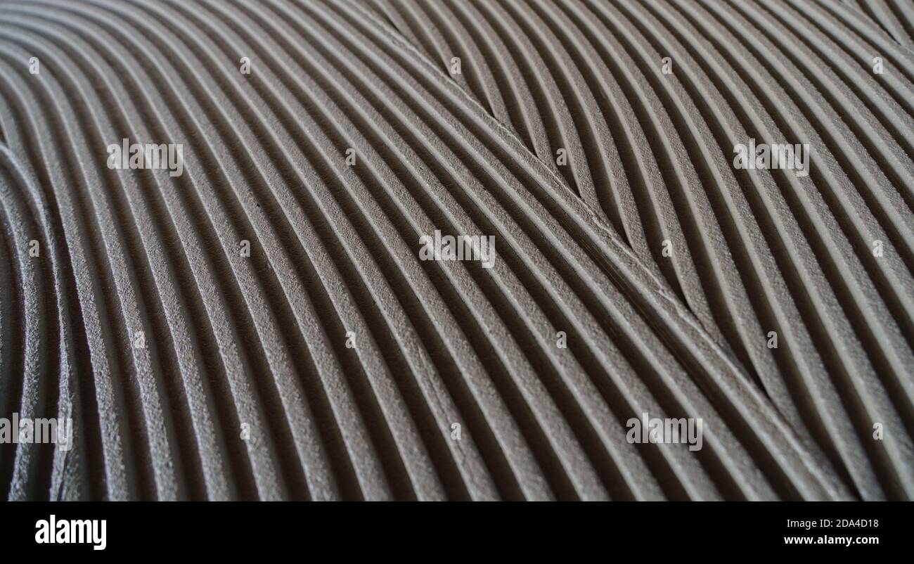 Texture glue Adhesive for tiles Stock Photo - Alamy