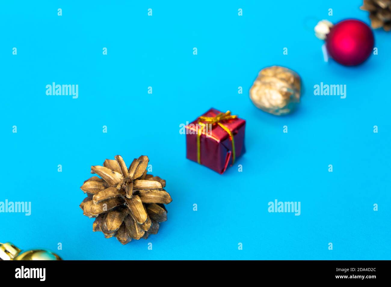 Christmas composition. Gifts, pine cones, Christmas tree decorations on ...