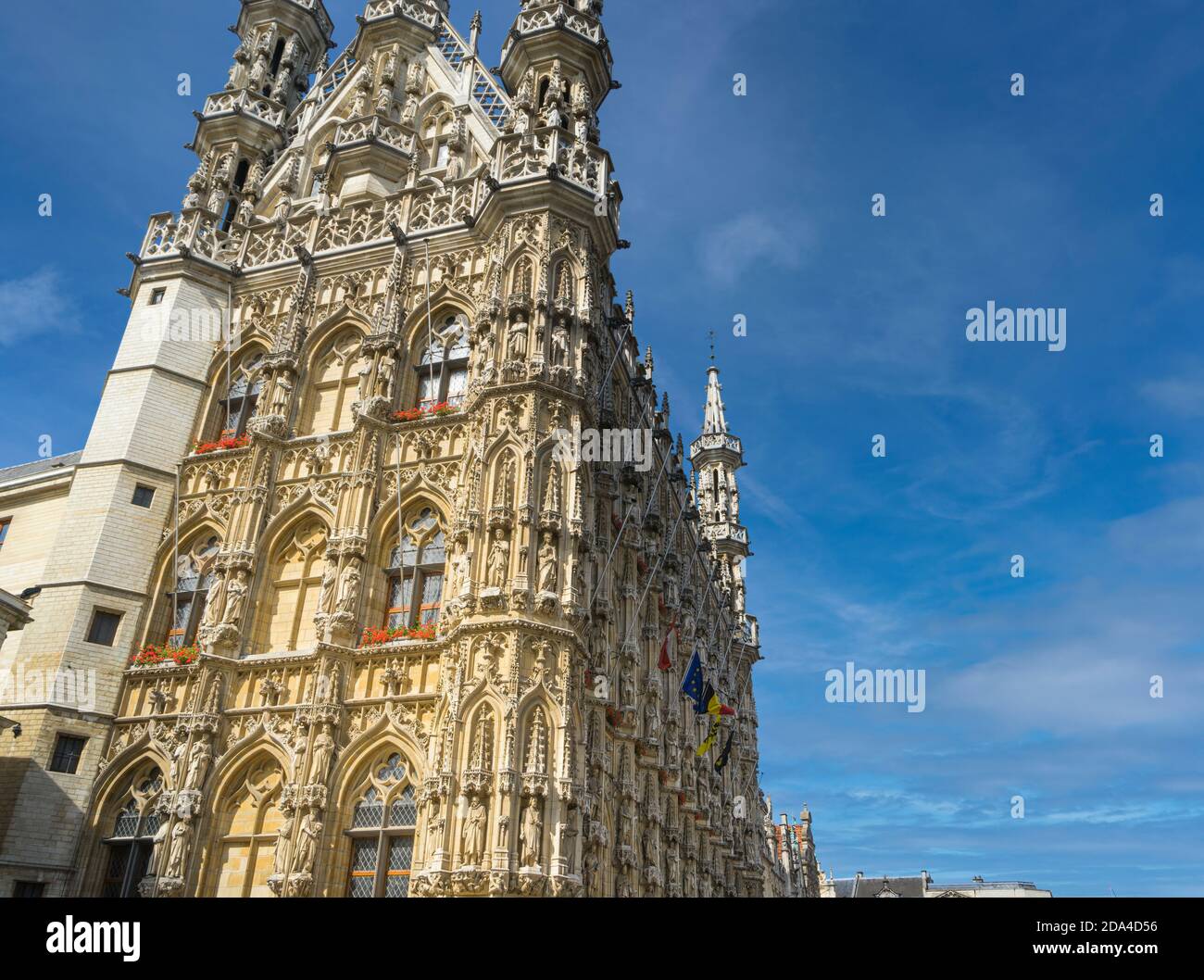 View of the main facade of the Gothic-style Belgian City of Leuven Town ...
