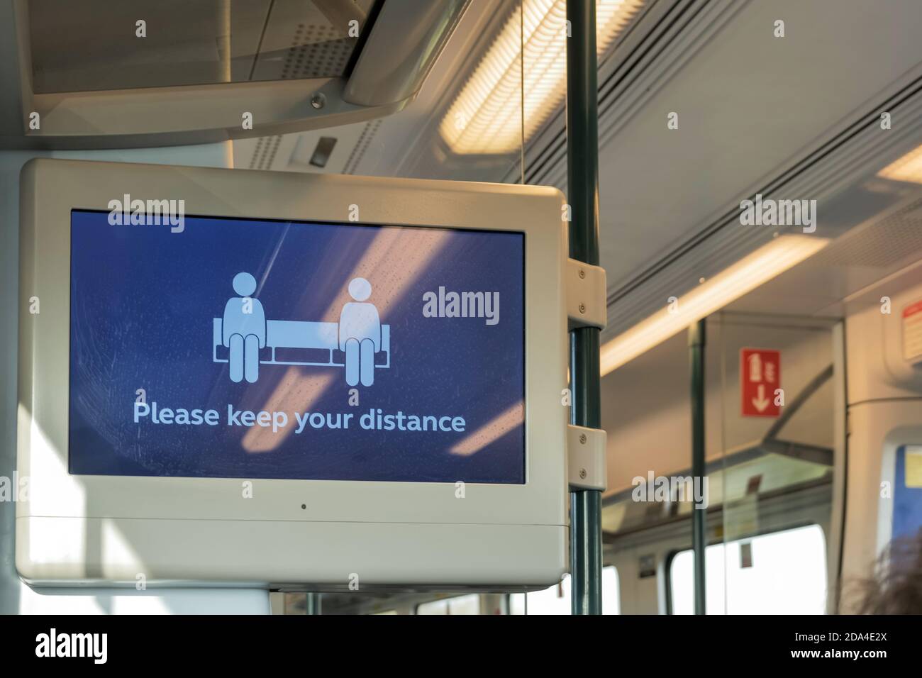 please keep your distance message on digital display on train during ...