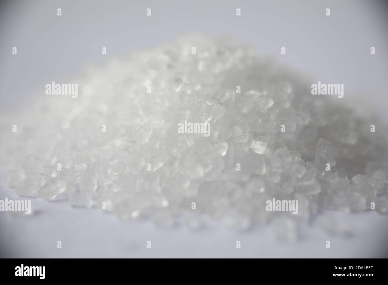 Pile of white sweetener Stock Photo - Alamy