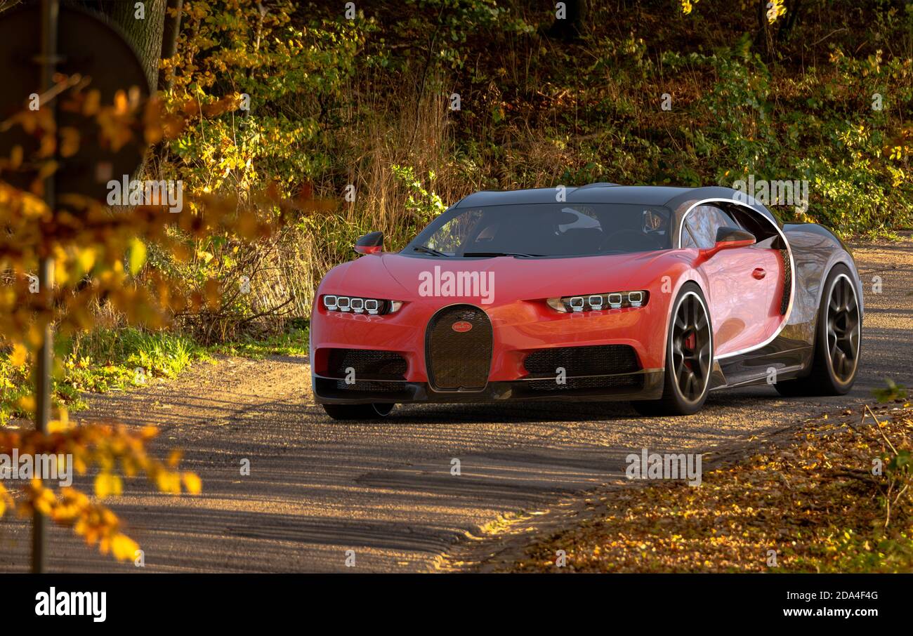 Bugatti Chiron driving on an autumn road Stock Photo - Alamy