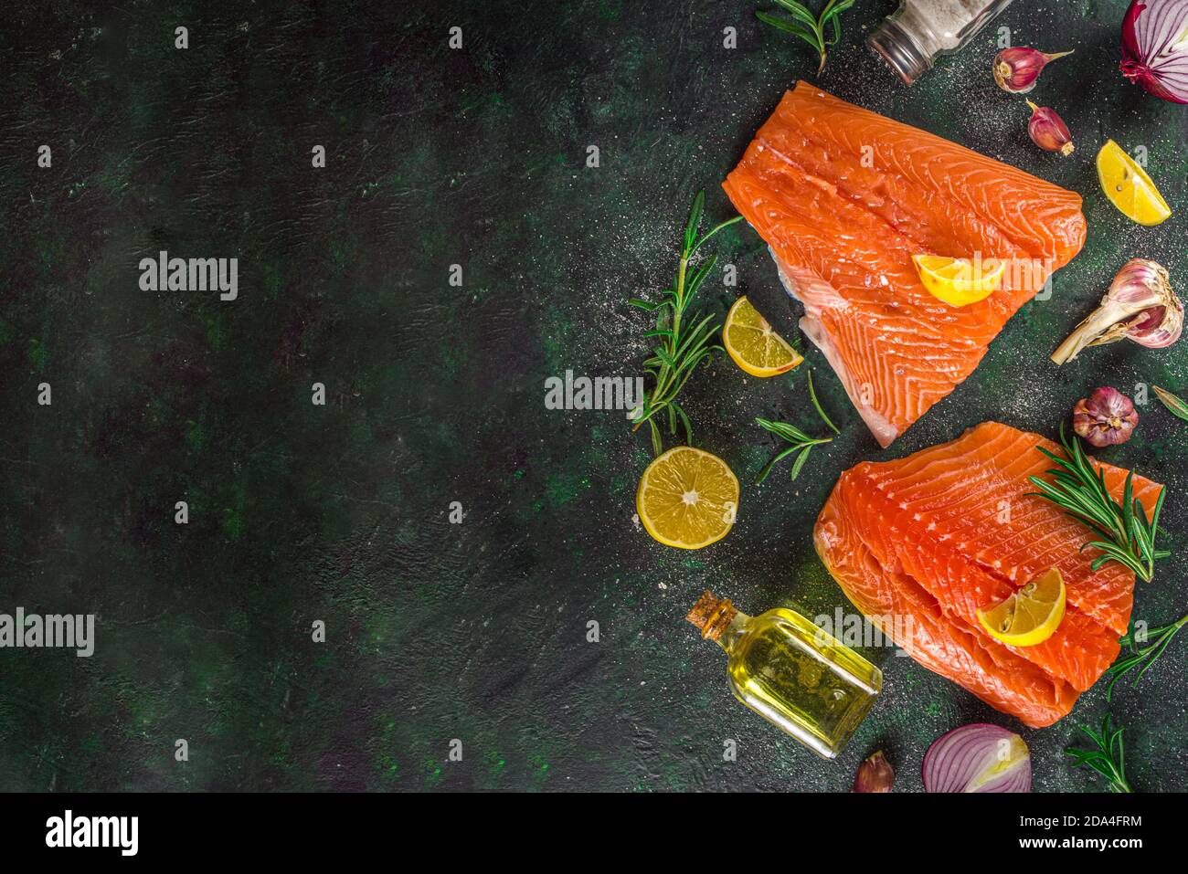 Salmon. Fresh raw salmon fish fillet with cooking ingredients, herbs ...