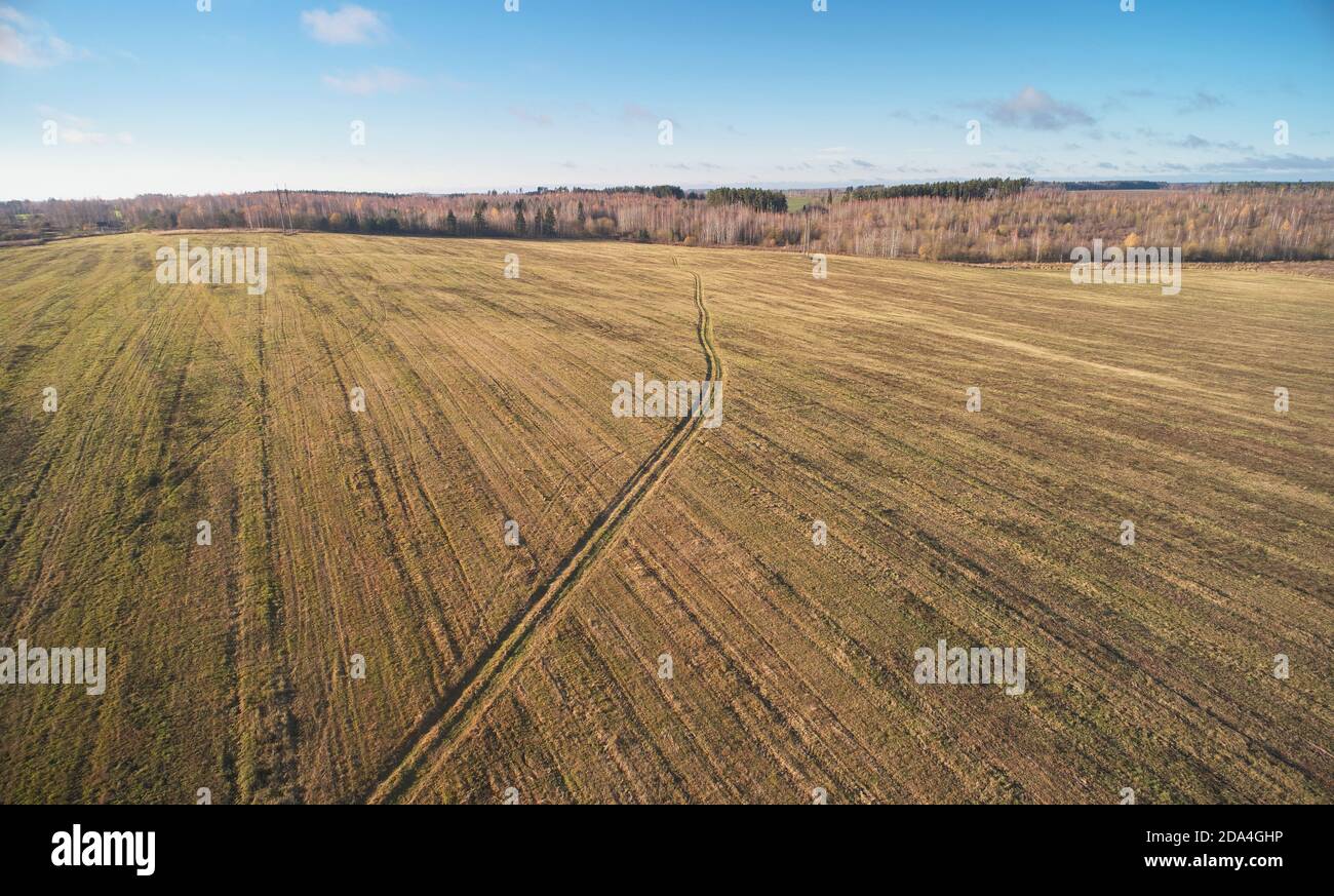 Aerial view of road through agricultural fields and forest hi-res stock ...