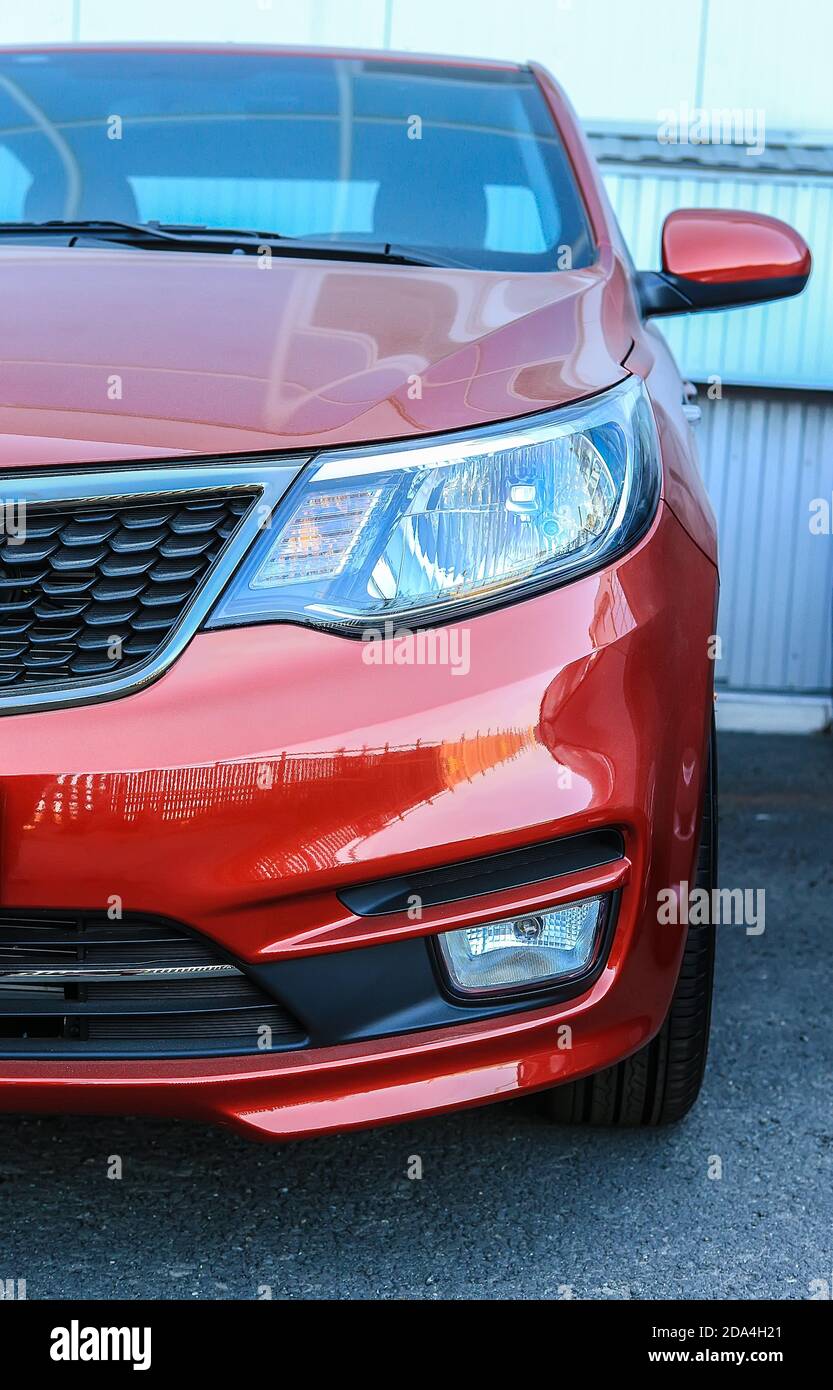 modern red car front view closeup Stock Photo - Alamy