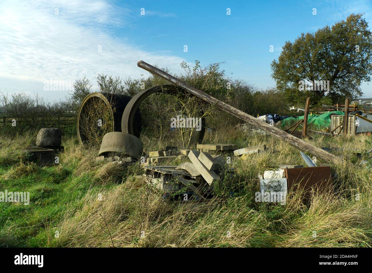 Large concrete sewer pipes in a junk yard Stock Photo - Alamy
