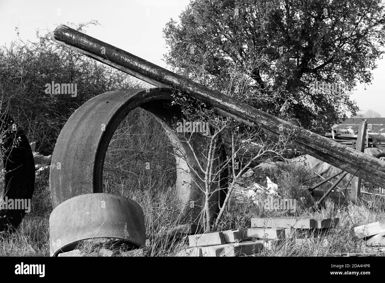 Large concrete sewer pipes in a junk yard Stock Photo - Alamy
