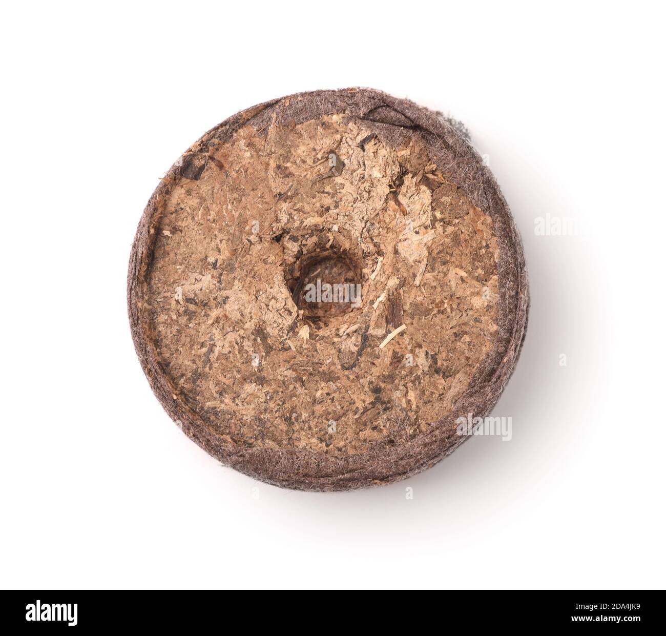 Top view of single dry peat pellet isolated on white Stock Photo - Alamy