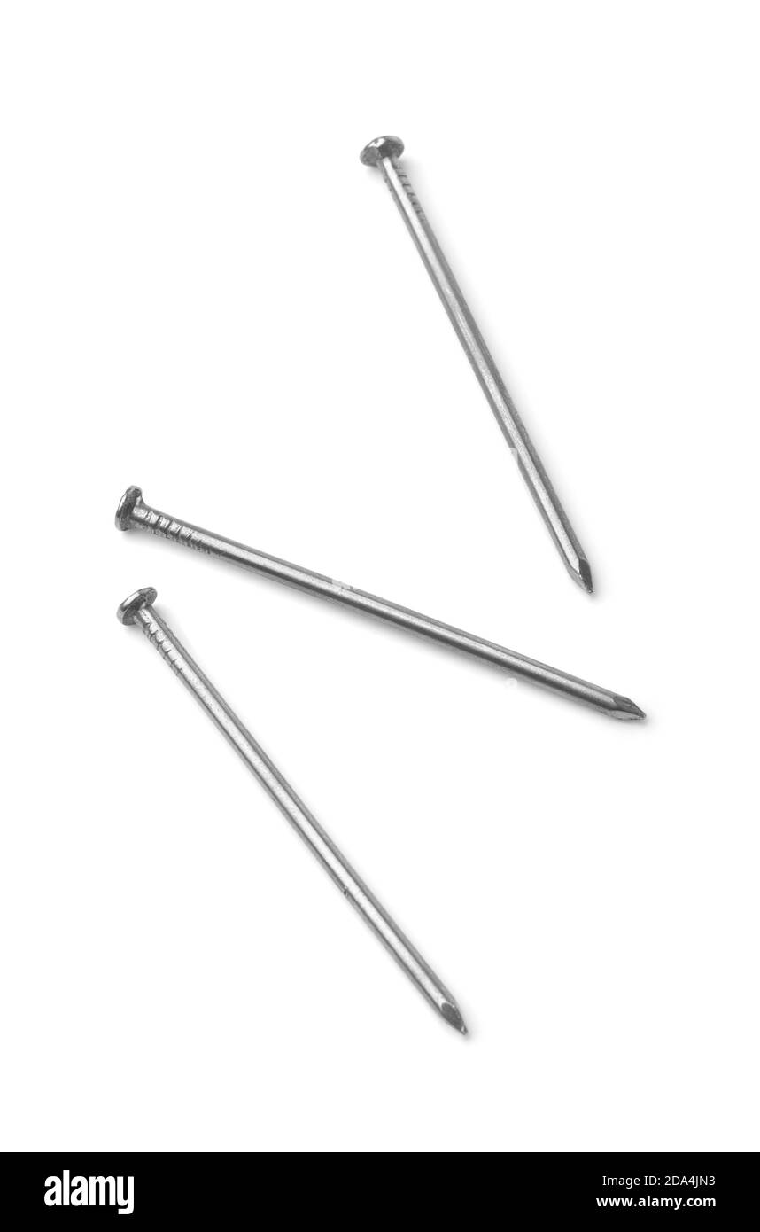 Three steel common nails isolated on white Stock Photo - Alamy