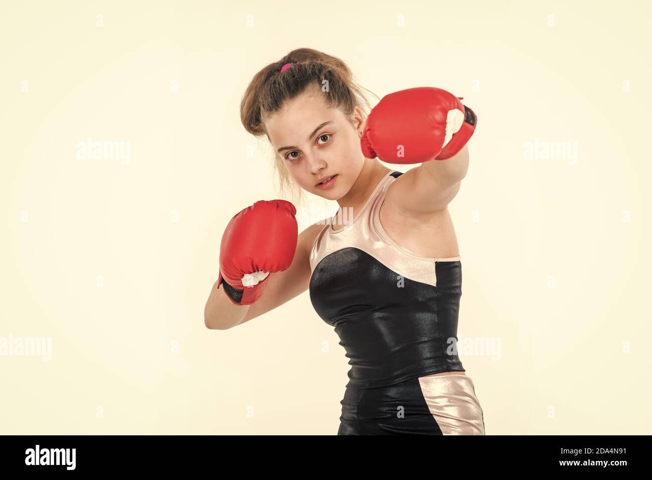 small girl training in boxing gloves. sport and fitness. teen girl ...