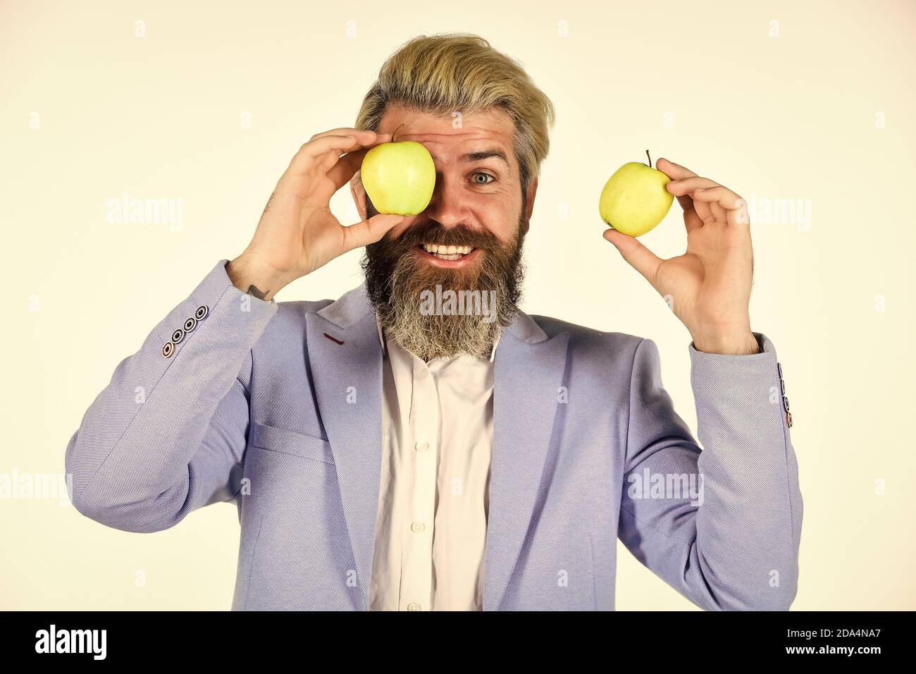 Cheerful smiling man with apples. Harvesting business. Apple became ...