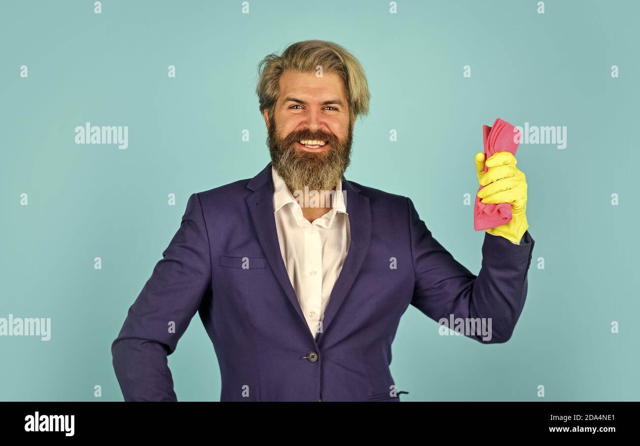 handsome businessman with washing gloves. use sponge and detergent for ...