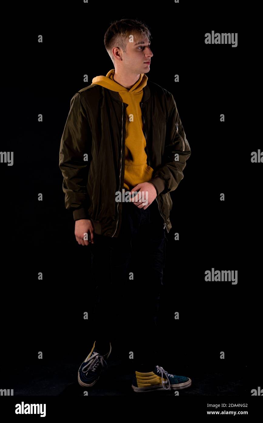 Full body shot of a trendy young man wearing modern style clothes Stock ...