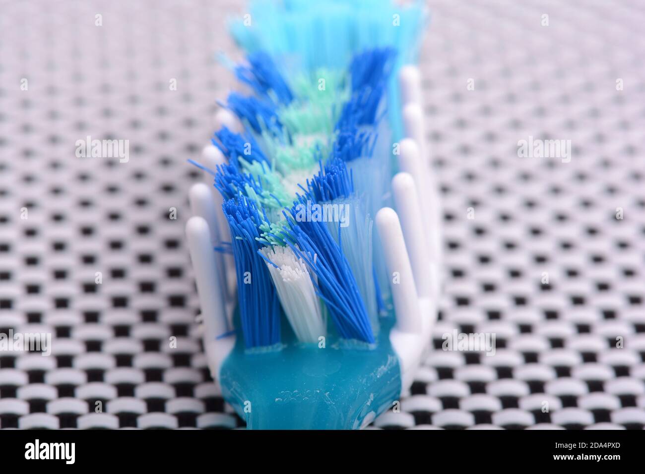 Used old toothbrush toothbrush on a black and white background Stock ...