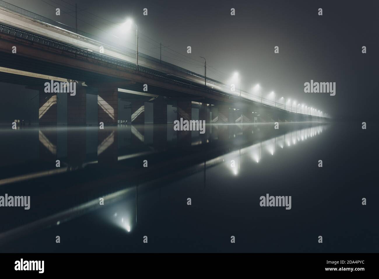 Bridge fading into a night fog, Northern bridge, Voronezh, Russia Stock ...