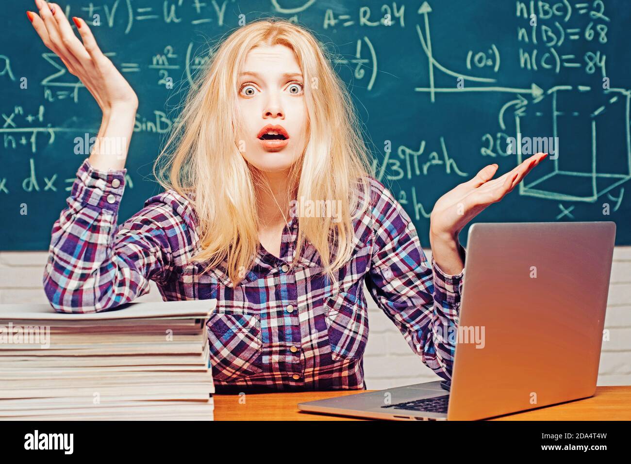 Emotional angry woman student screaming on classroom chalkboard ...
