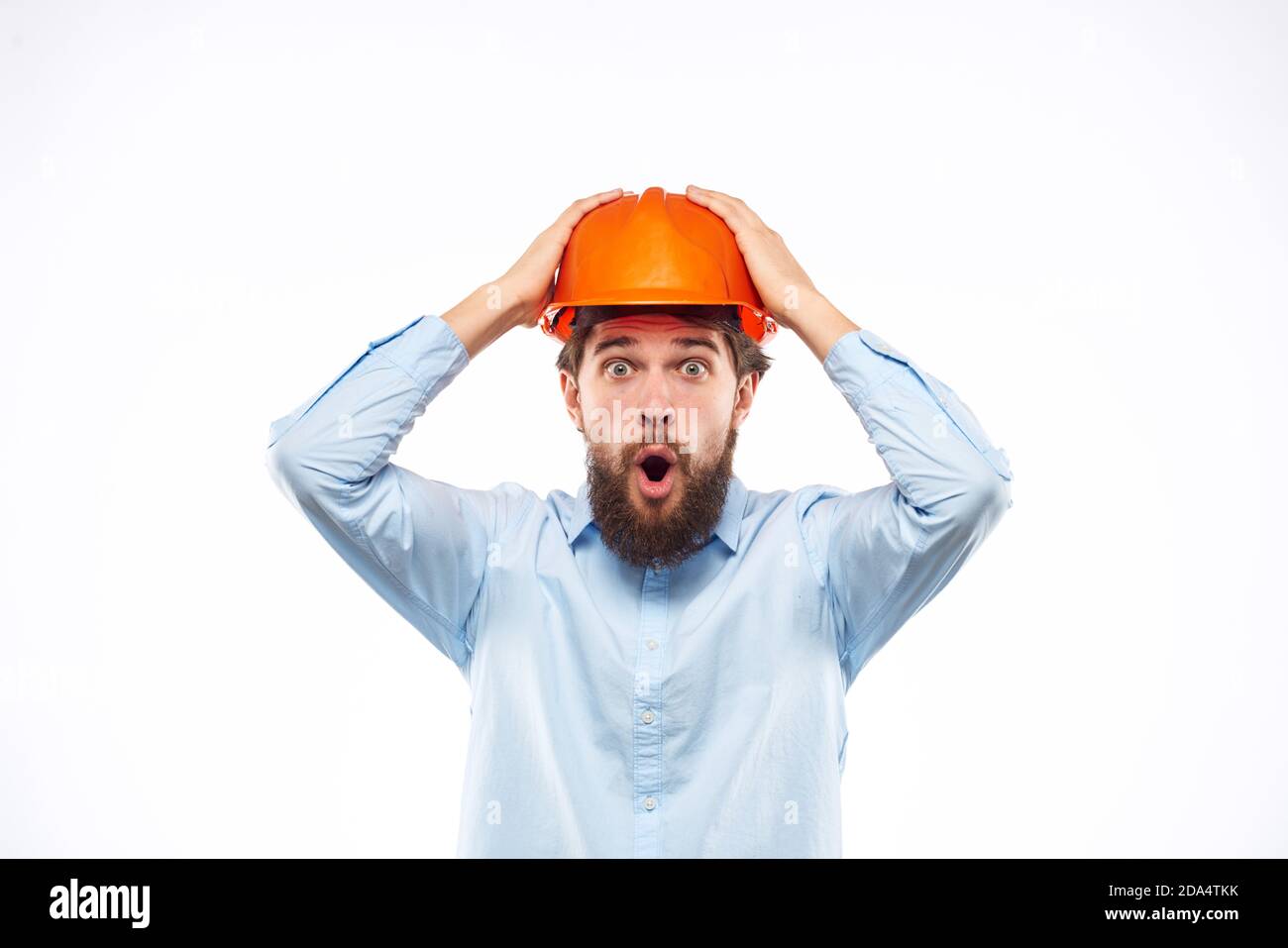 engineer in orange safety helmet in construction emotions professional ...
