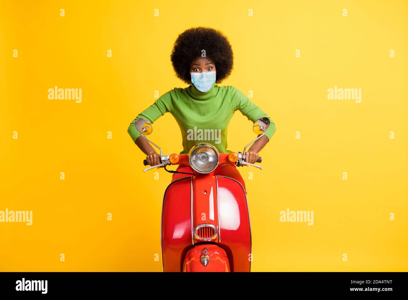Photo portrait of excited woman driving bike forwarduse flu mask ...