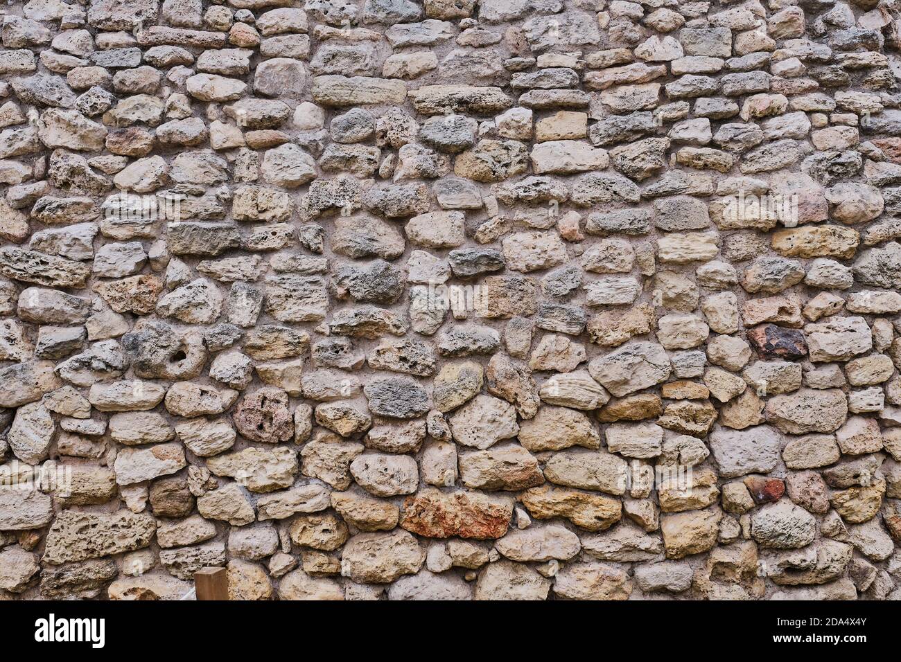 Texture of a very ancient stone wall as a background Stock Photo - Alamy