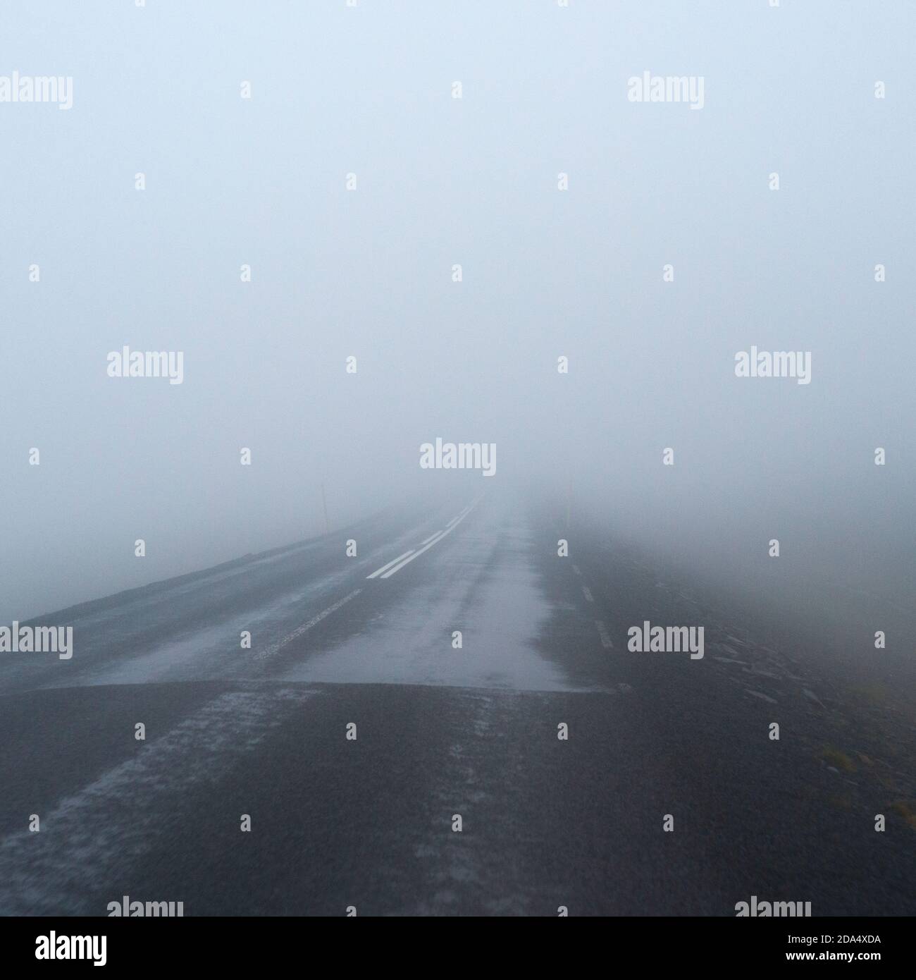Fog over road, Seydisfjordur, Eastern Region, Iceland Stock Photo - Alamy