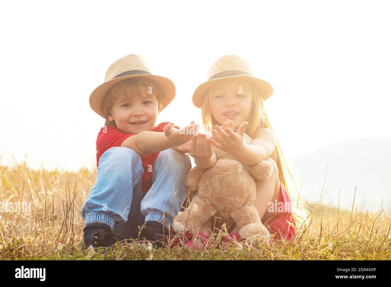 Children farmer in the farm with countryside background. Active family ...