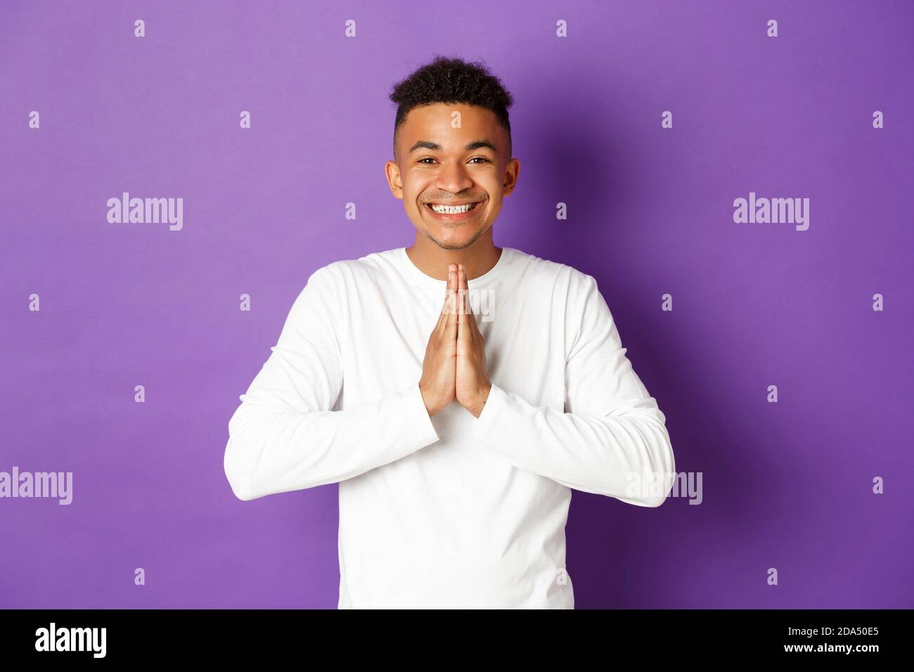 Image of smiling handsome african-american man, thanking for help ...