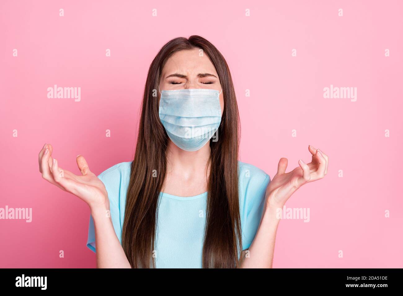 Photo of furious woman wear blue face mask isolated pink pastel color ...