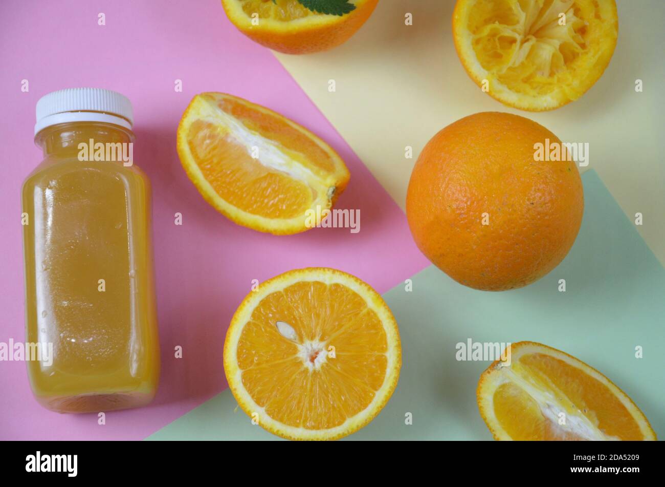 Bottle of orange juice shot. orange organic freshly squeezed juice in a ...