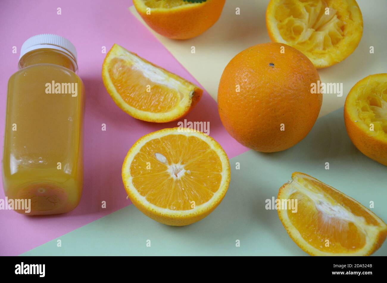 Bottle of orange juice shot. orange organic freshly squeezed juice in a ...