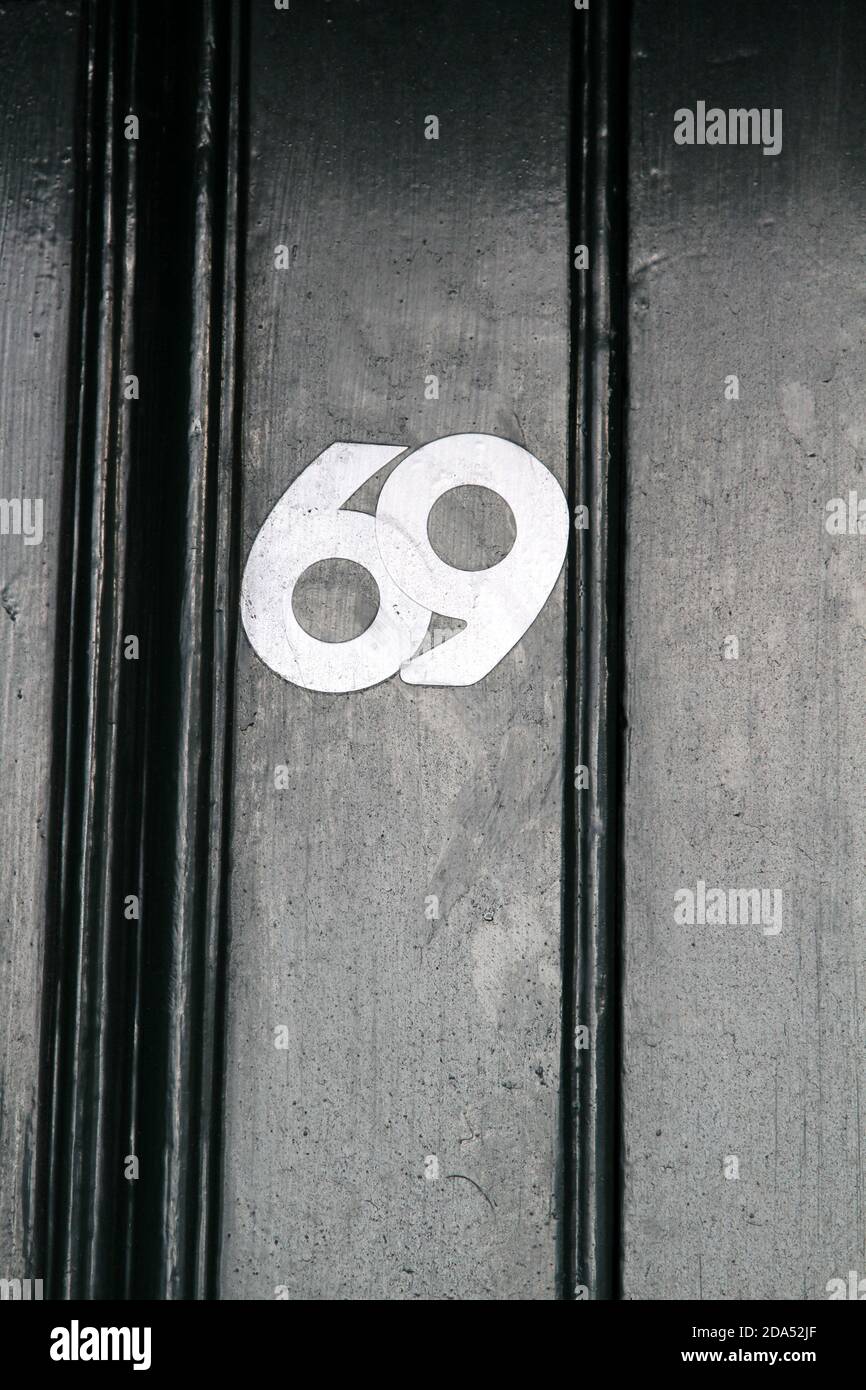 Number, various, on wall, clocks, signs , advertising , vehicles. House ...