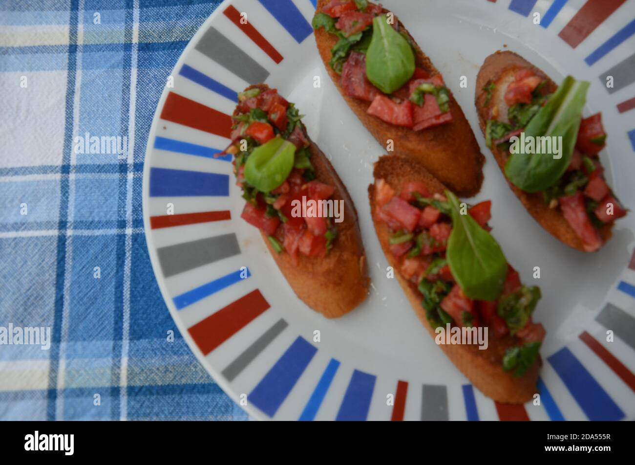 Traditional italian bruschetta with cherry tomatoes, cream cheese ...
