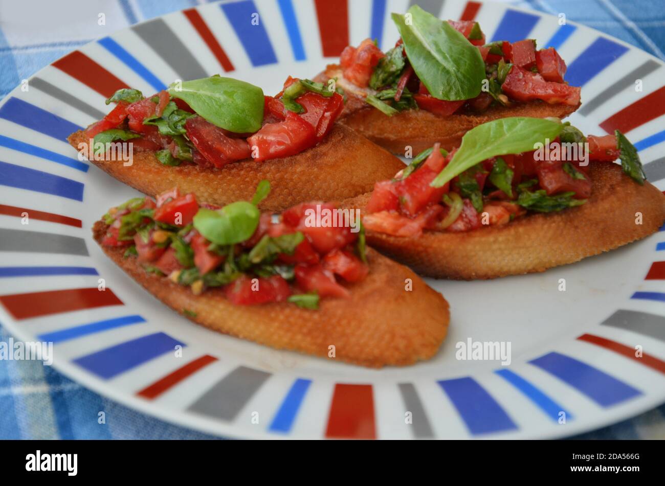 Traditional italian bruschetta with cherry tomatoes, cream cheese ...
