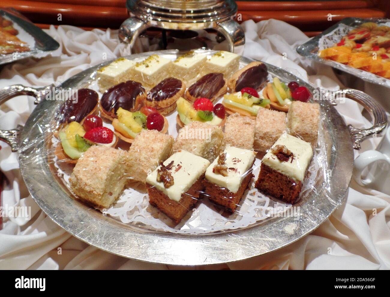 Tray of cakes, eclairs and other desserts Stock Photo - Alamy